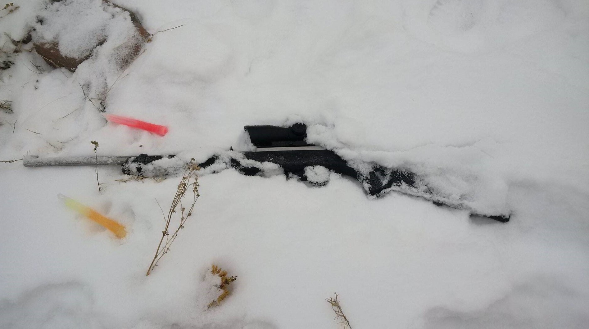 Loaded semi-automatic rifle recovered from the snow in West Valley ...