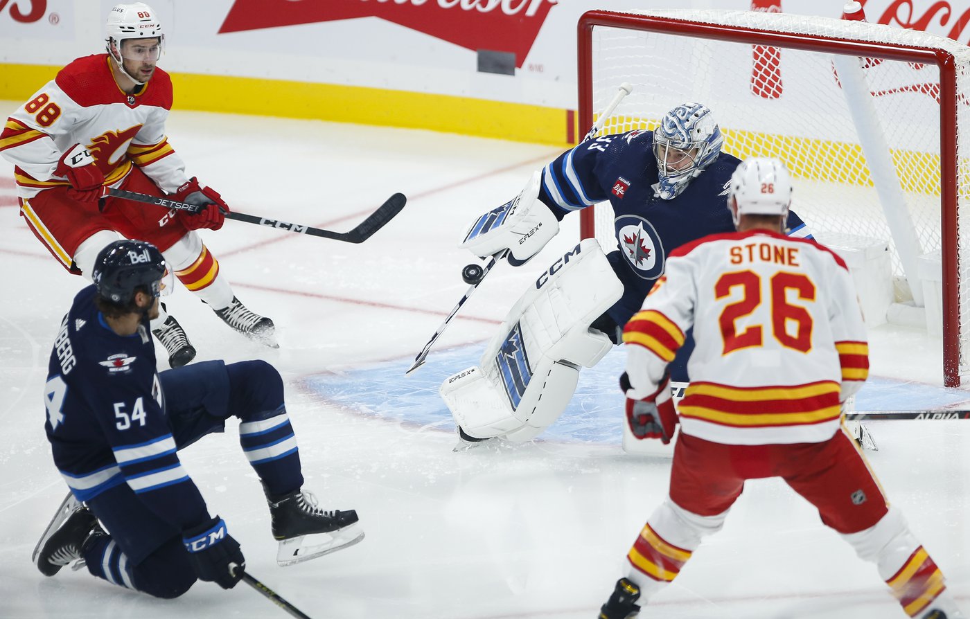 Jets dominate Flames behind Rittich's 37 saves, four second-period ...