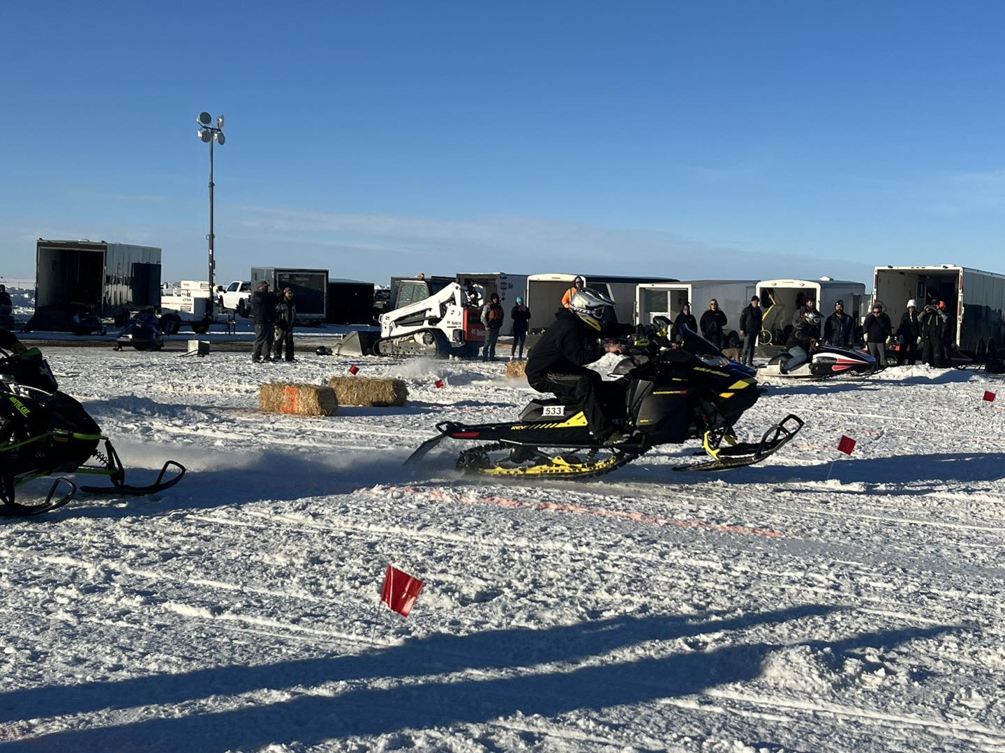WATCH: Fantastic day of snowmobile drag racing captured by drone ...