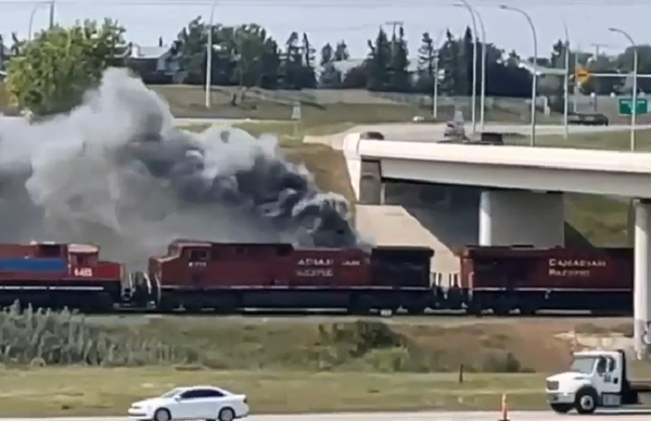 Watch: Train catches fire; Airdrie fire crews douse flames ...