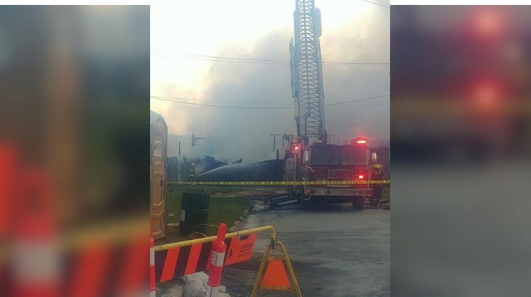 Firefighter injured, homes evacuated as fire tears through Logan Avenue ...