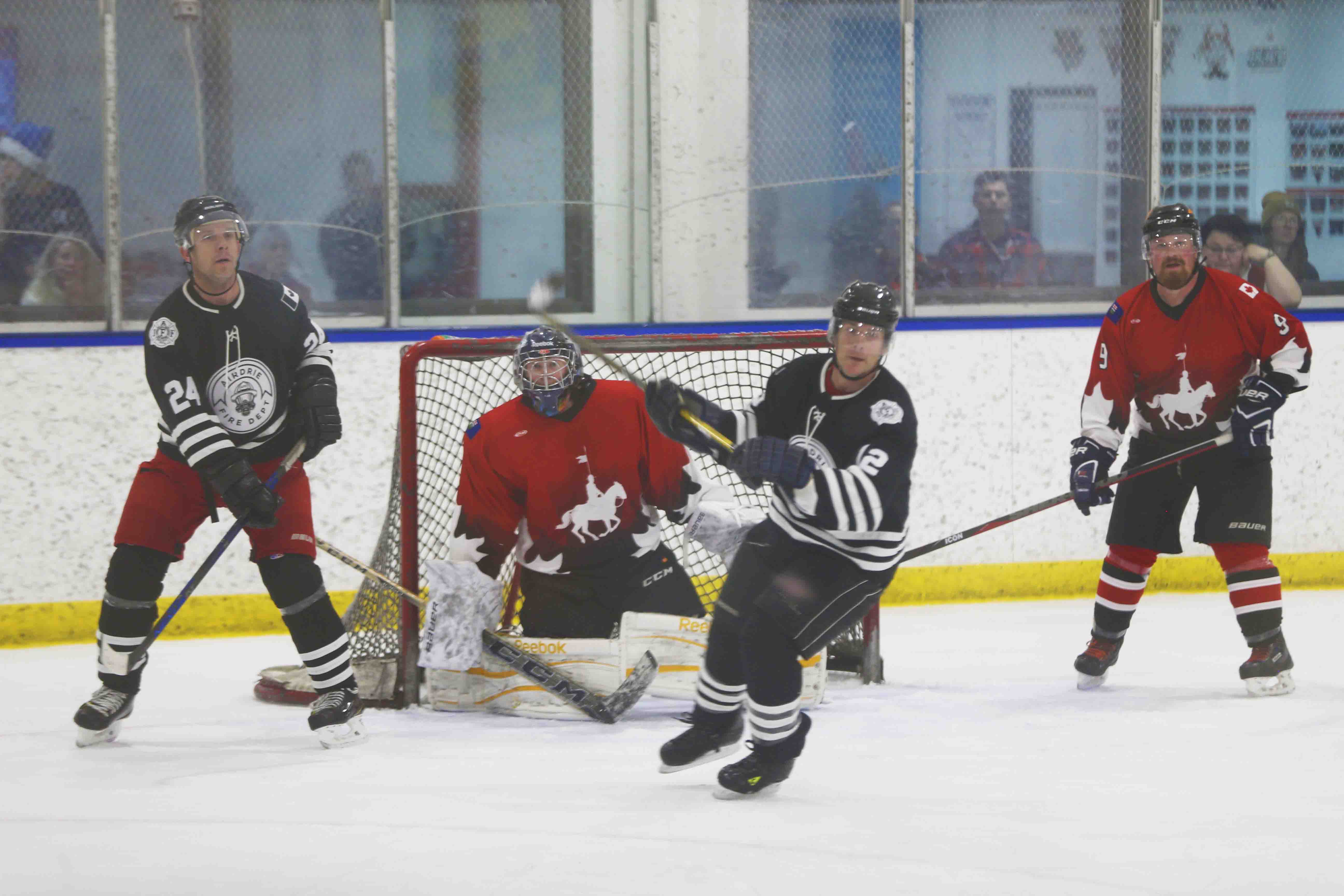 Watch / Gallery: Airdrie mounties come out blaring in Sirens hockey ...
