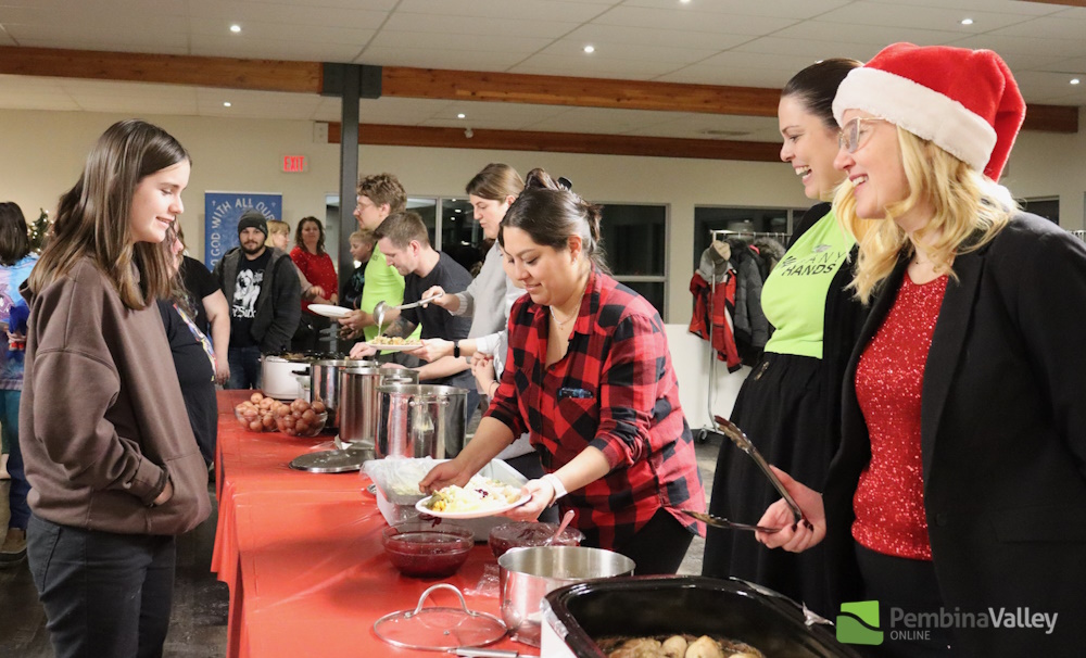 Many Hands Resource Center's holiday community meal attracts a diverse ...