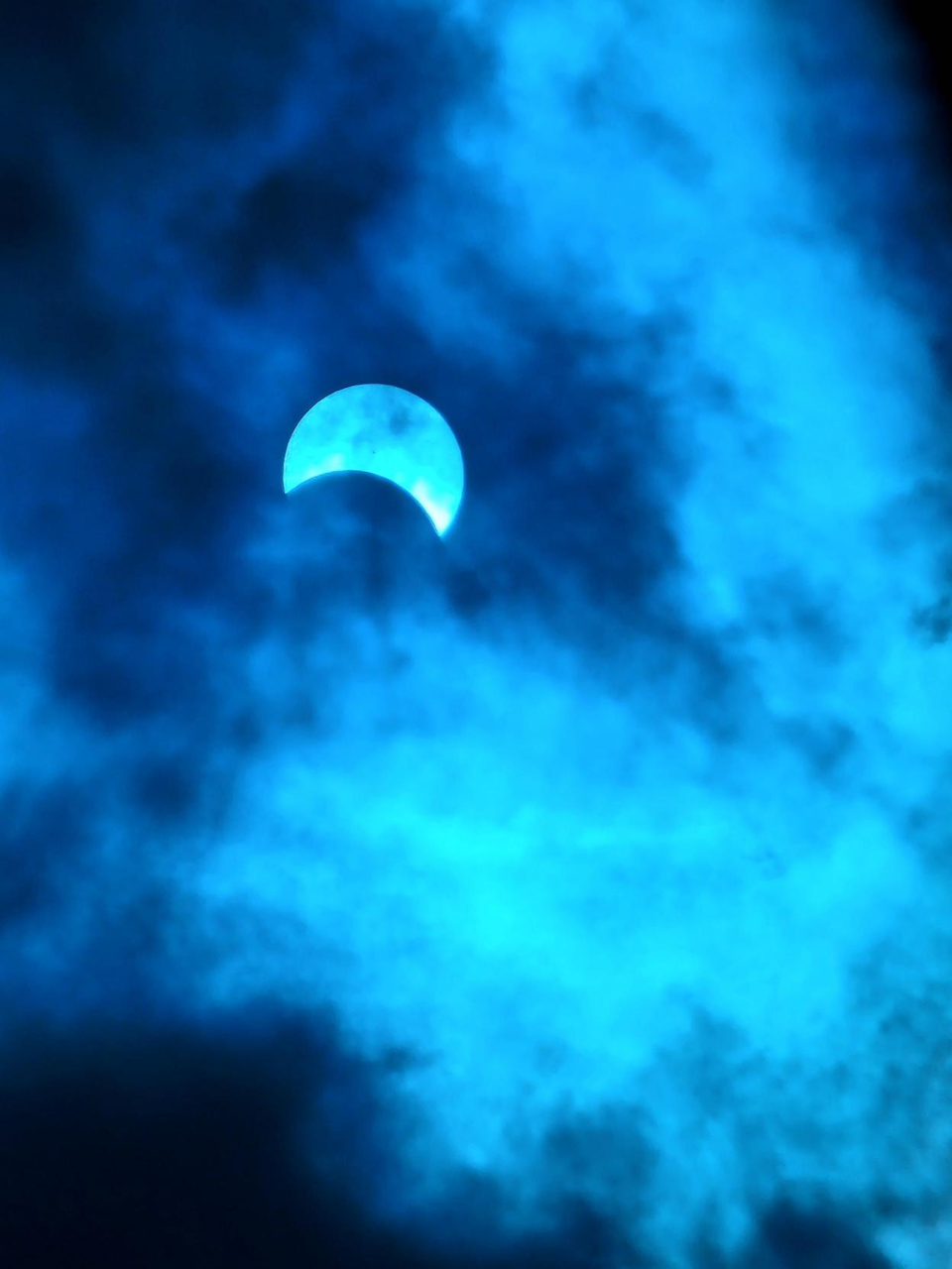 Weyburn residents capture solar eclipse through the clouds ...