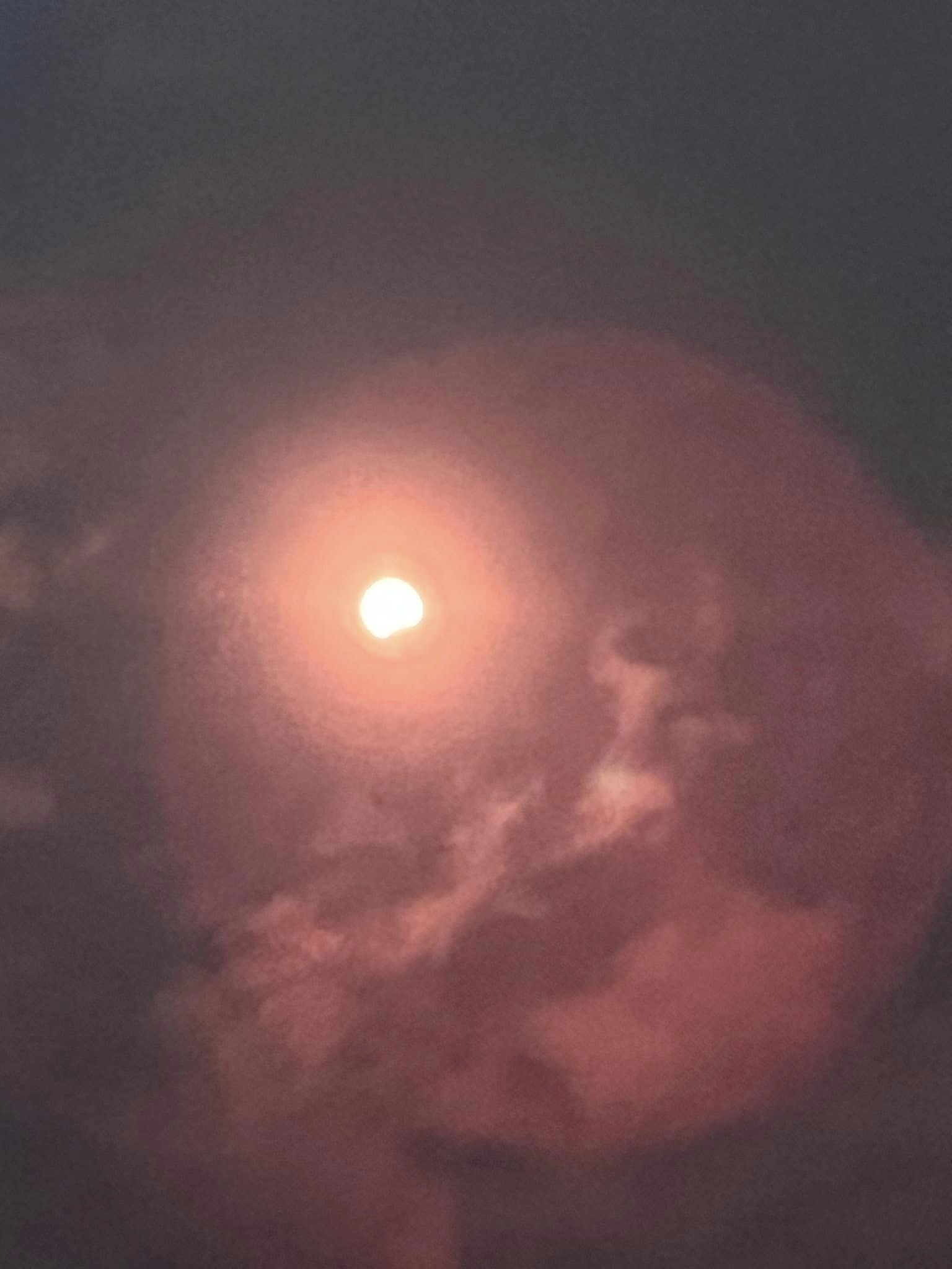 Weyburn residents capture solar eclipse through the clouds ...