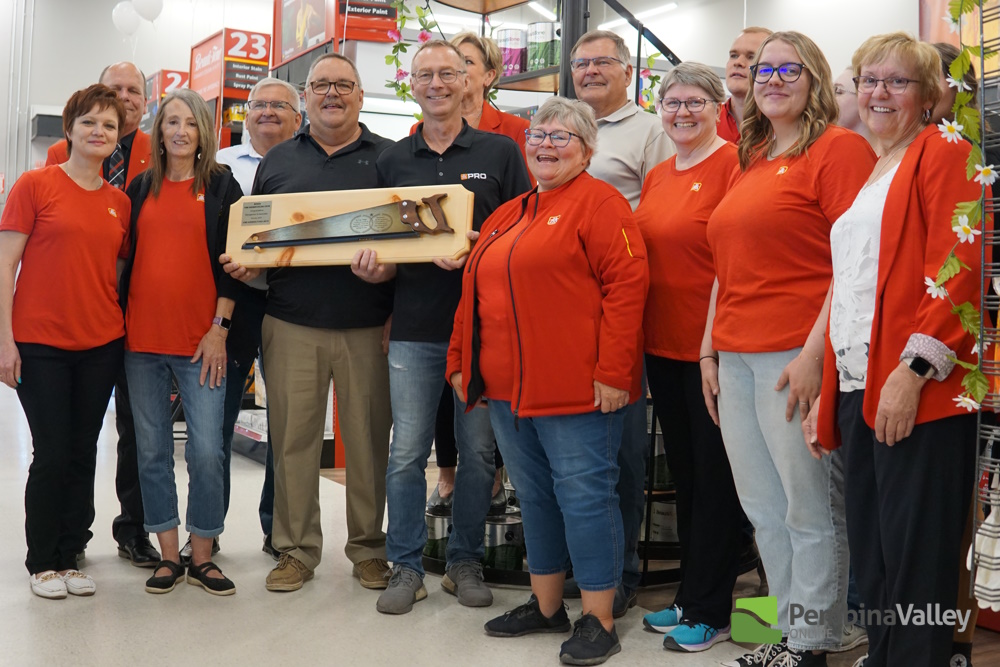 Golden saw presented to Richard Dyck at Morden Home Hardware Building ...