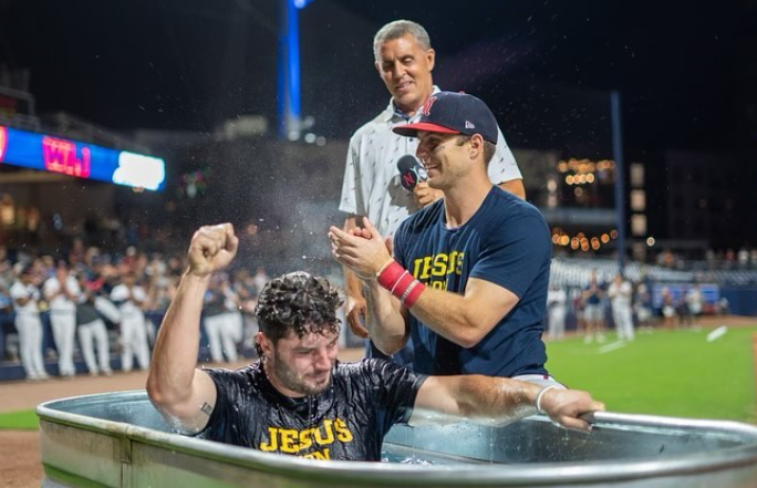 Professional baseball player gets baptized on field after game ...