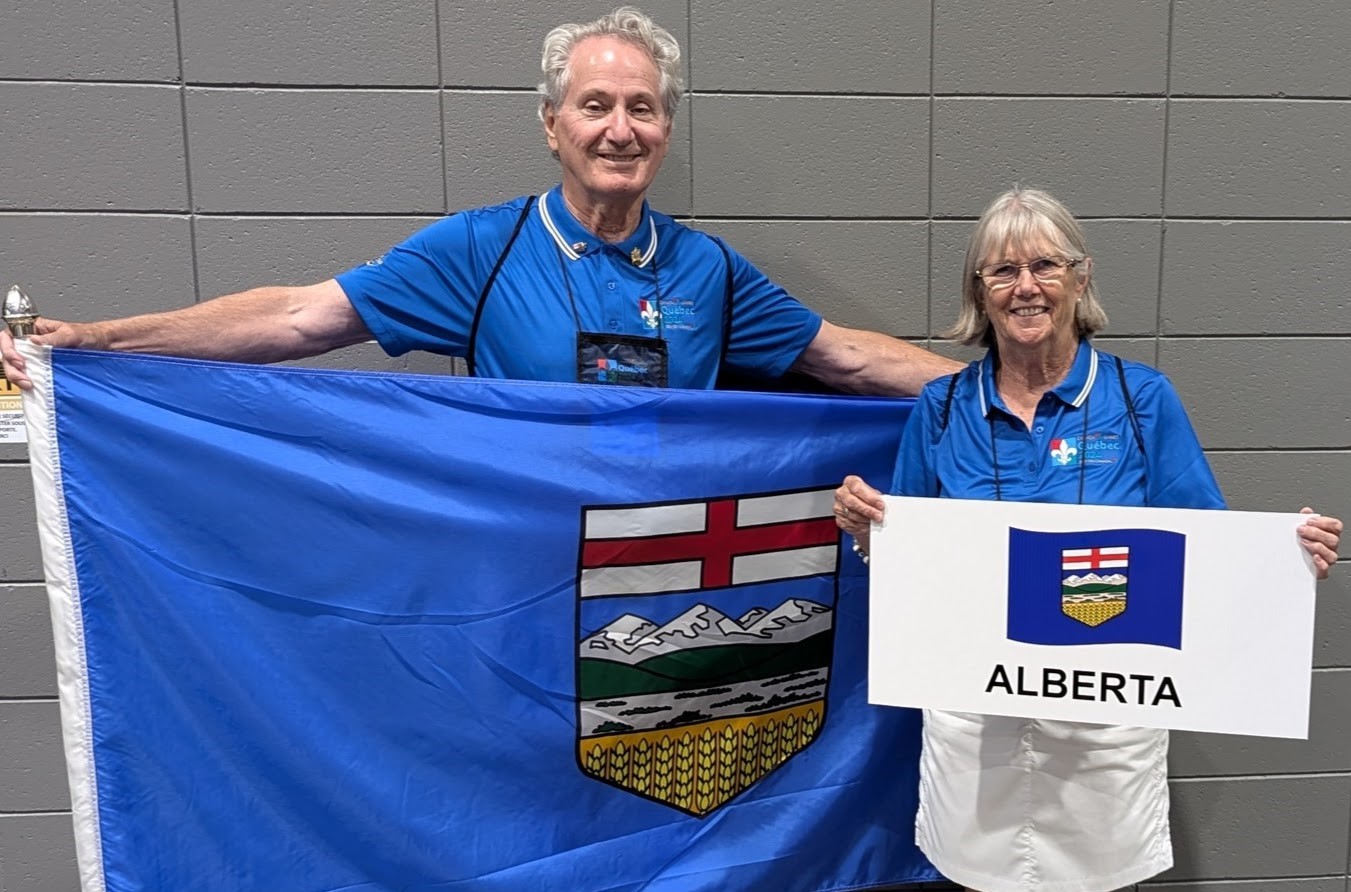Cochranite carries Alberta flag in Canada 55+ Games opening ceremony ...