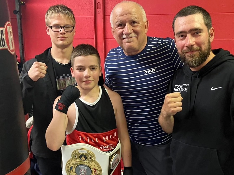 Chestermere child boxer returns from Edmonton with championship belt ...