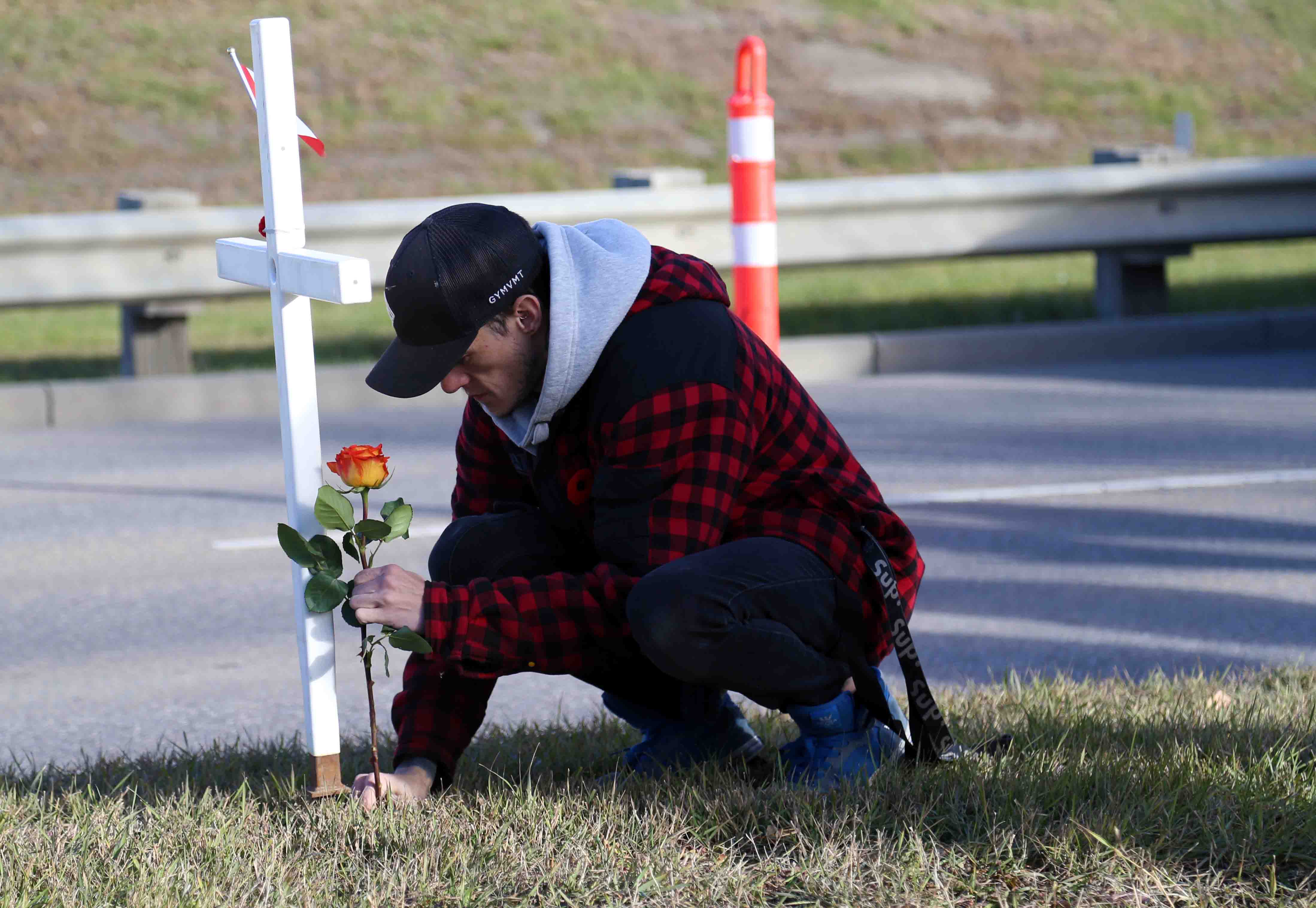 Gallery: Crosses line Veterans Boulevard as Airdrie residents remember ...