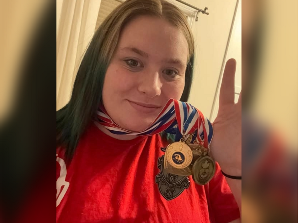 Strathmore swimmer wins gold at Special Olympics swim meet ...