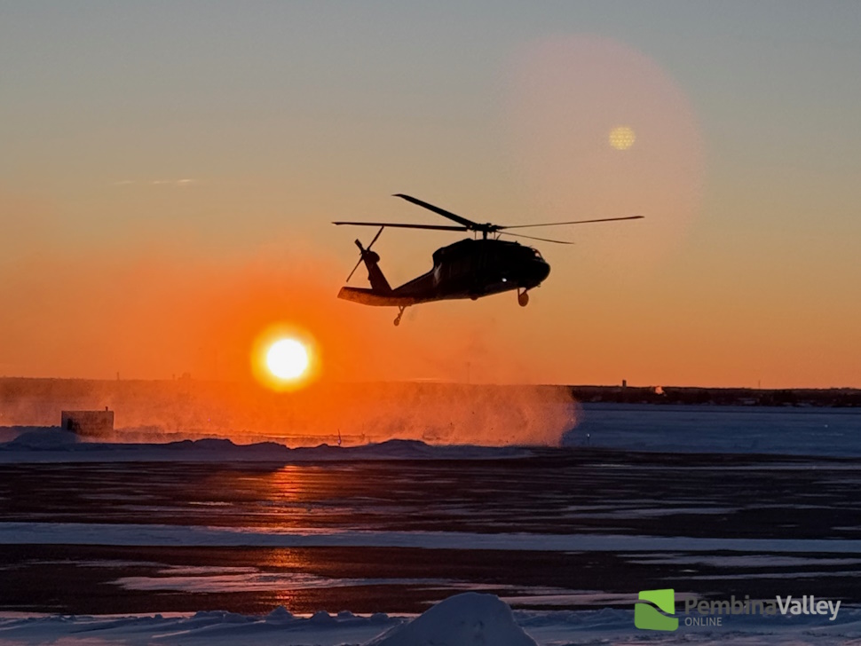 Local aviation enthusiast spotlights RCMP helicopter landing at Morden ...