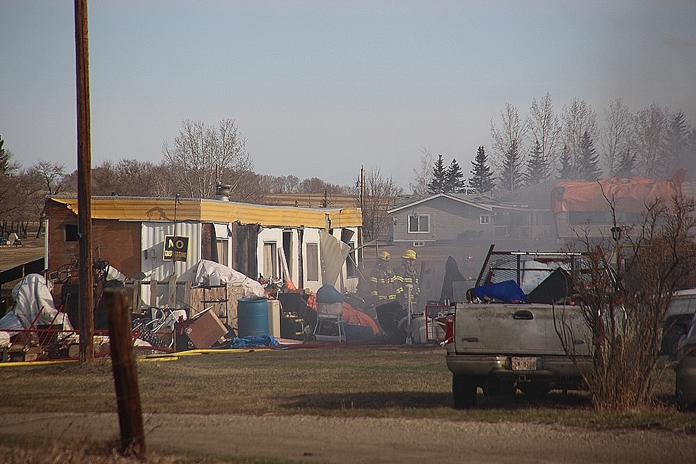 Public urged to avoid area as crews battle fire near Chestermere ...