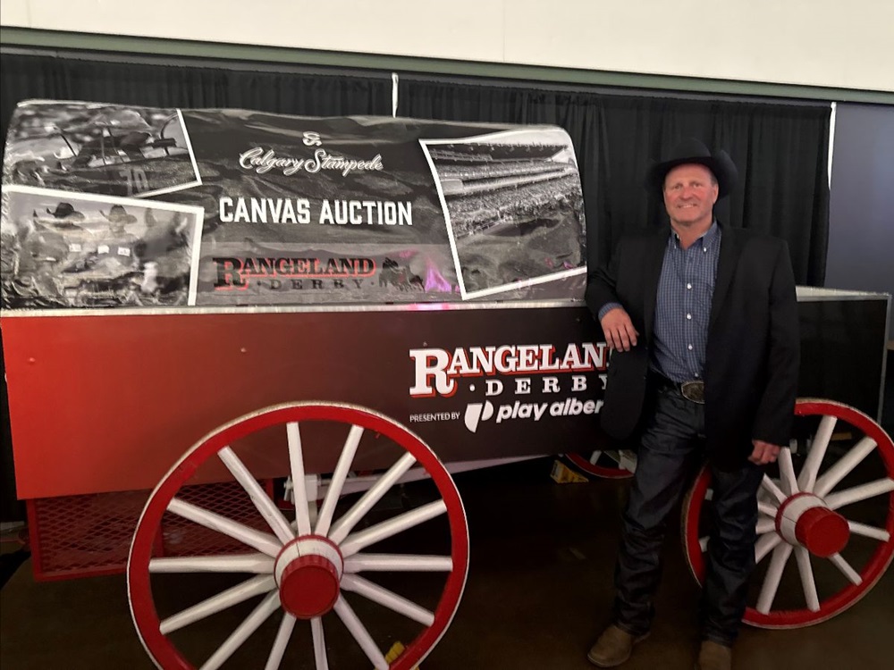Jason Glass takes top bid at Calgary Stampede Canvas Auction last night ...