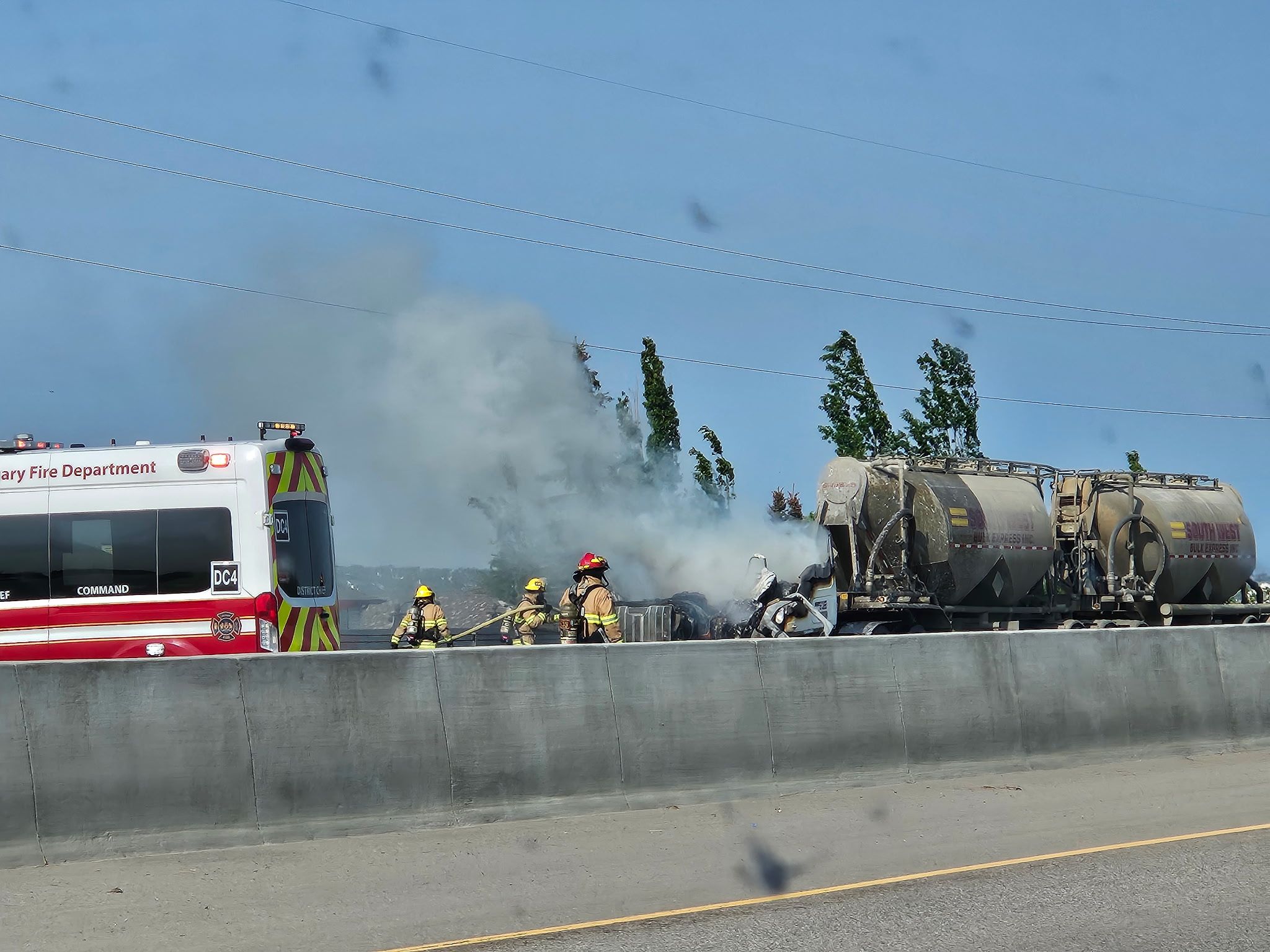 Update: Fuel tanker fire closes westbound Highway 1 at Stoney Trail ...
