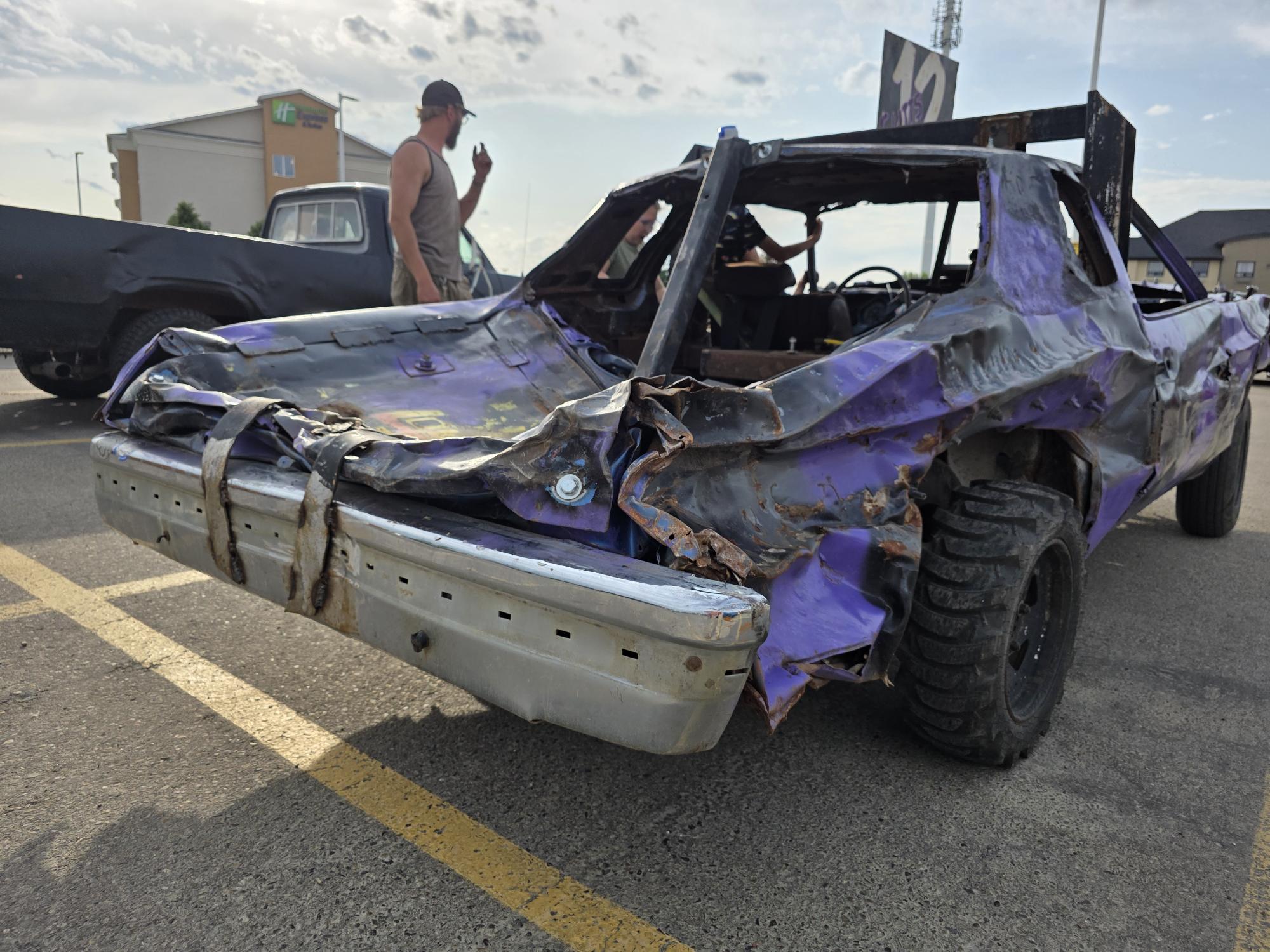 Under the Hood of this rough and tumble demolition derby car ...