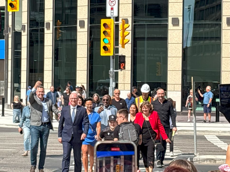 Winnipeg’s iconic corner reopens with Mayor Gillingham leading first ...