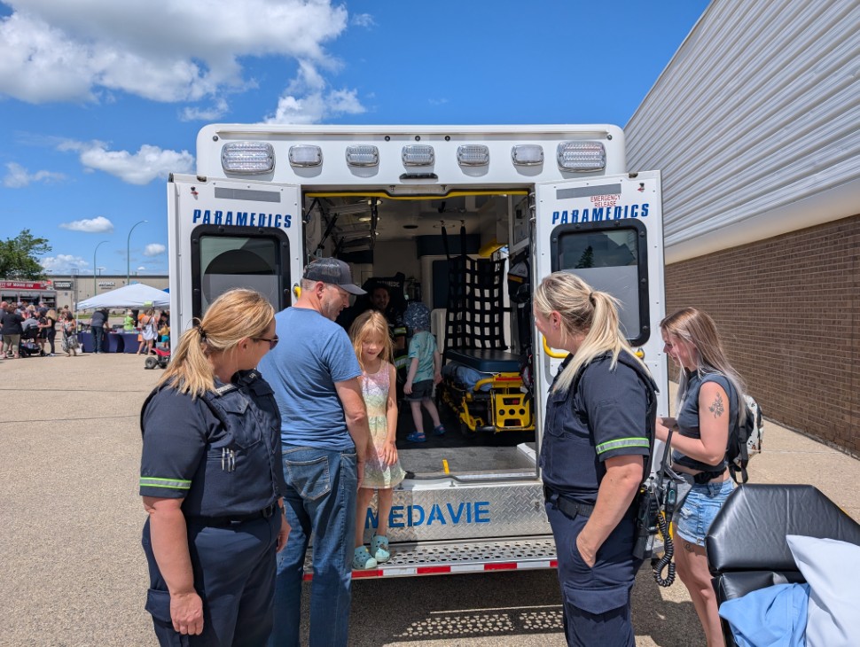 Kids climb aboard for face paint, flashing lights, and fun at Truck-A ...