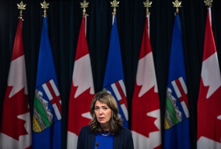 Premier Danielle Smith defends new COVID shot administration fee during ...