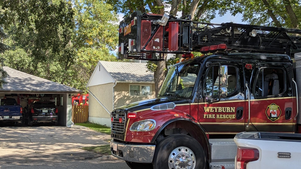 Emergency crews on the scene of garage fire on 11th Street ...