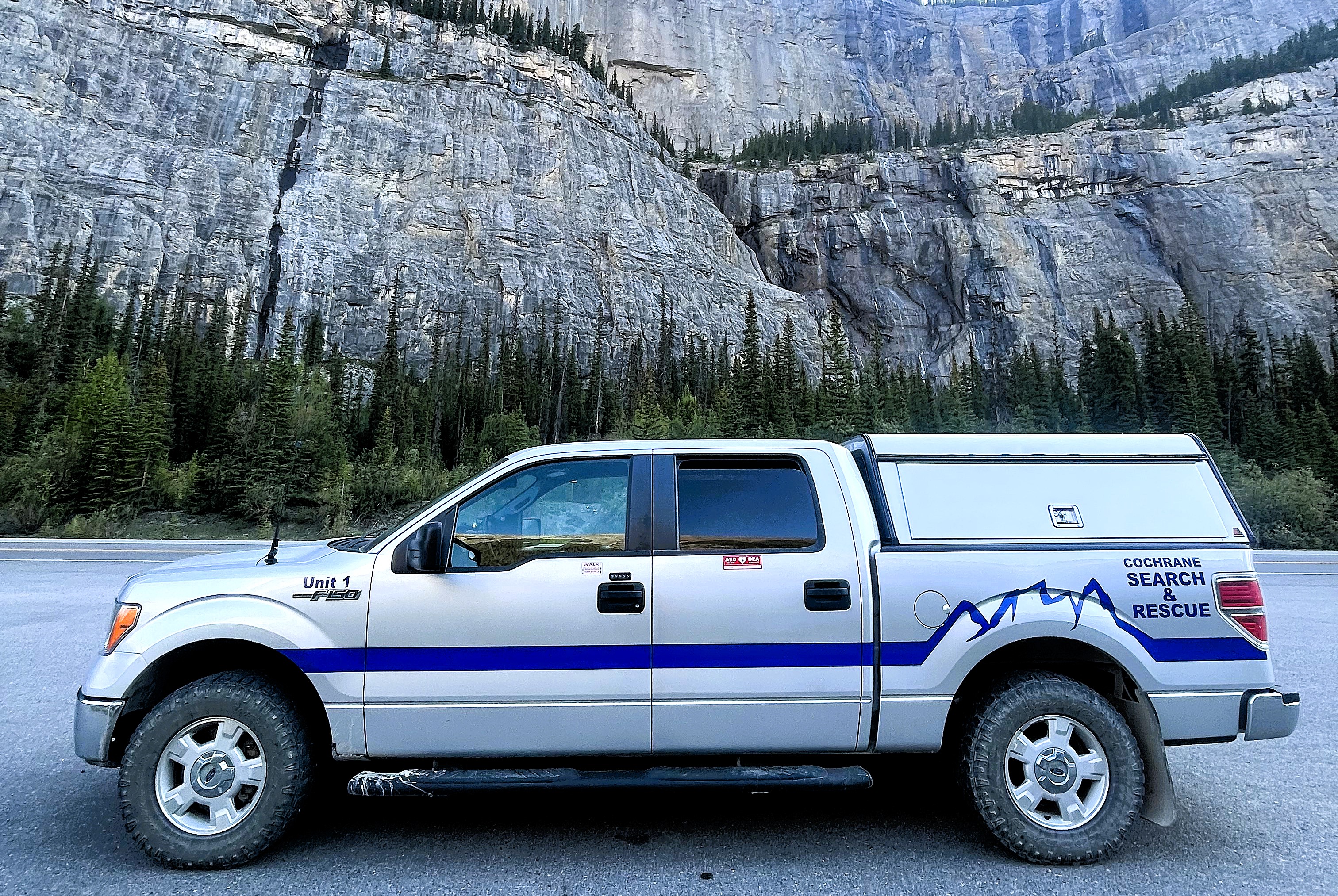 Five riders pedal north, backed by Cochrane SAR chase vehicle ...