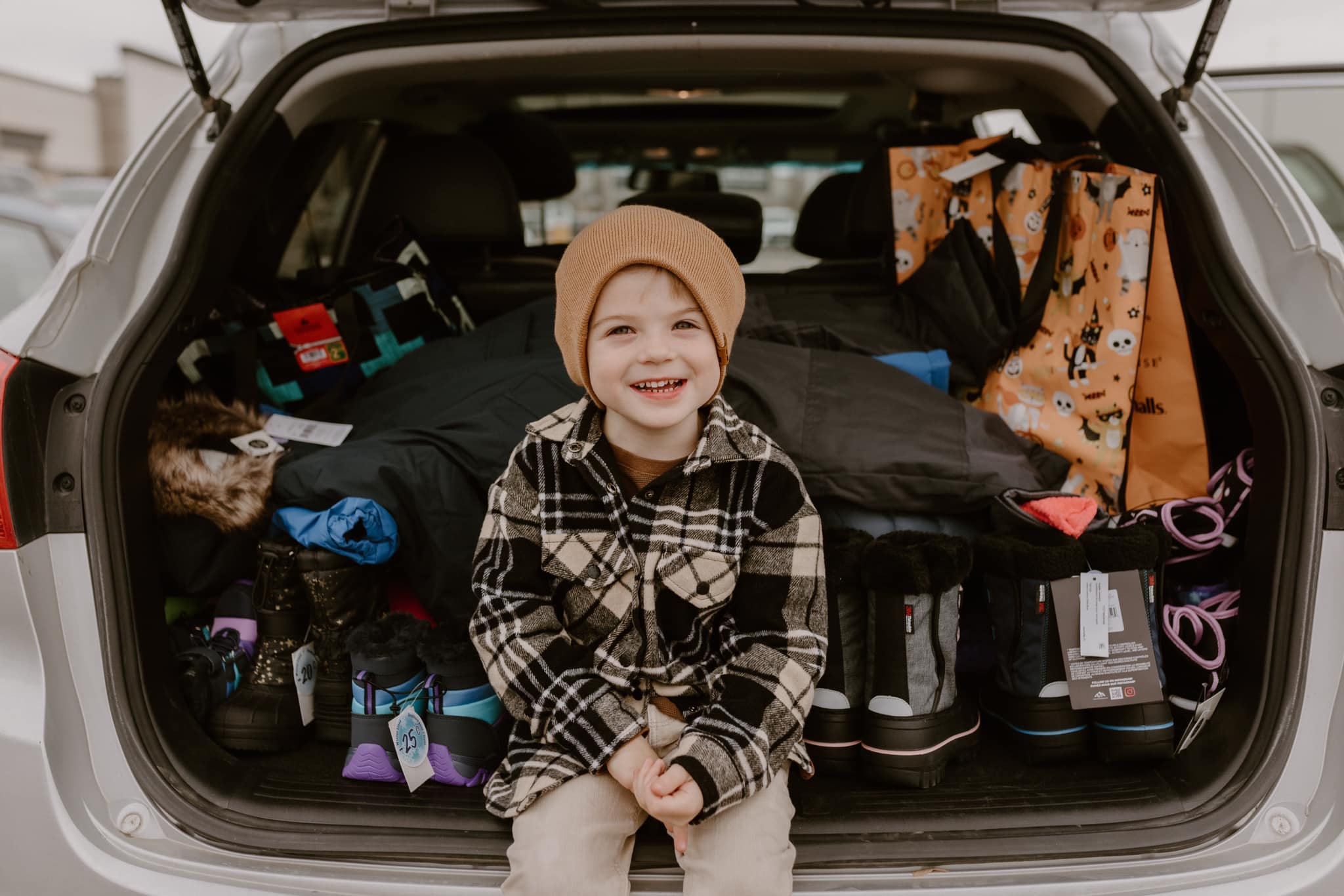 Local photographer and young son bring warmth to kids this winter, one ...