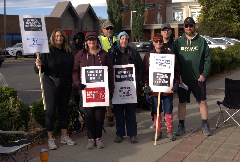 Local postal workers on the picket line as Canada Post strike continues ...