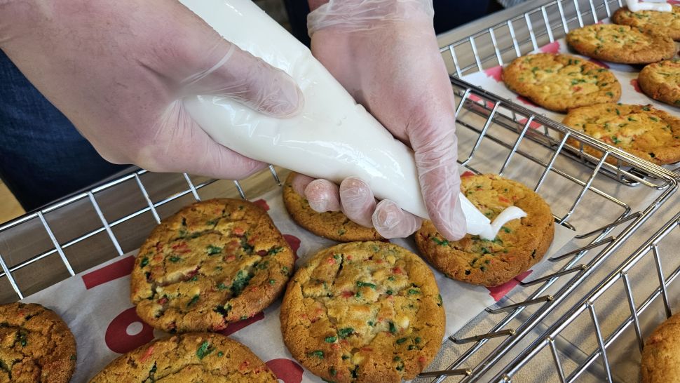 Council joins volunteers in massive Holiday Smile Cookie fundraiser ...