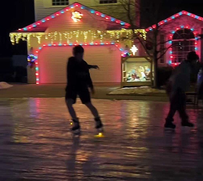 Cochranites turn frozen street into skating rink - CochraneNow ...