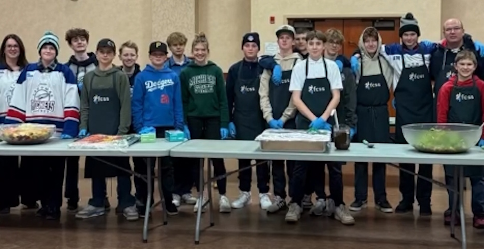 Serving smiles: Lacombe hockey players pitch in at FCSS community ...