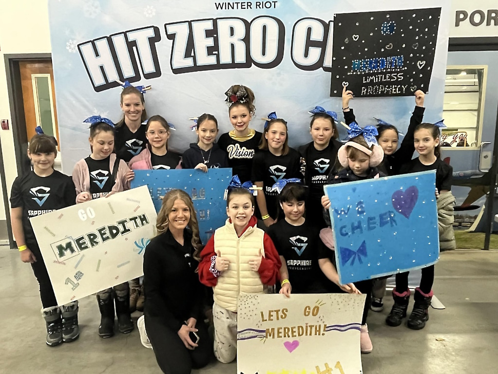 Local U8 and U12 cheerleaders rally behind coach at Winter Riot Cheer ...