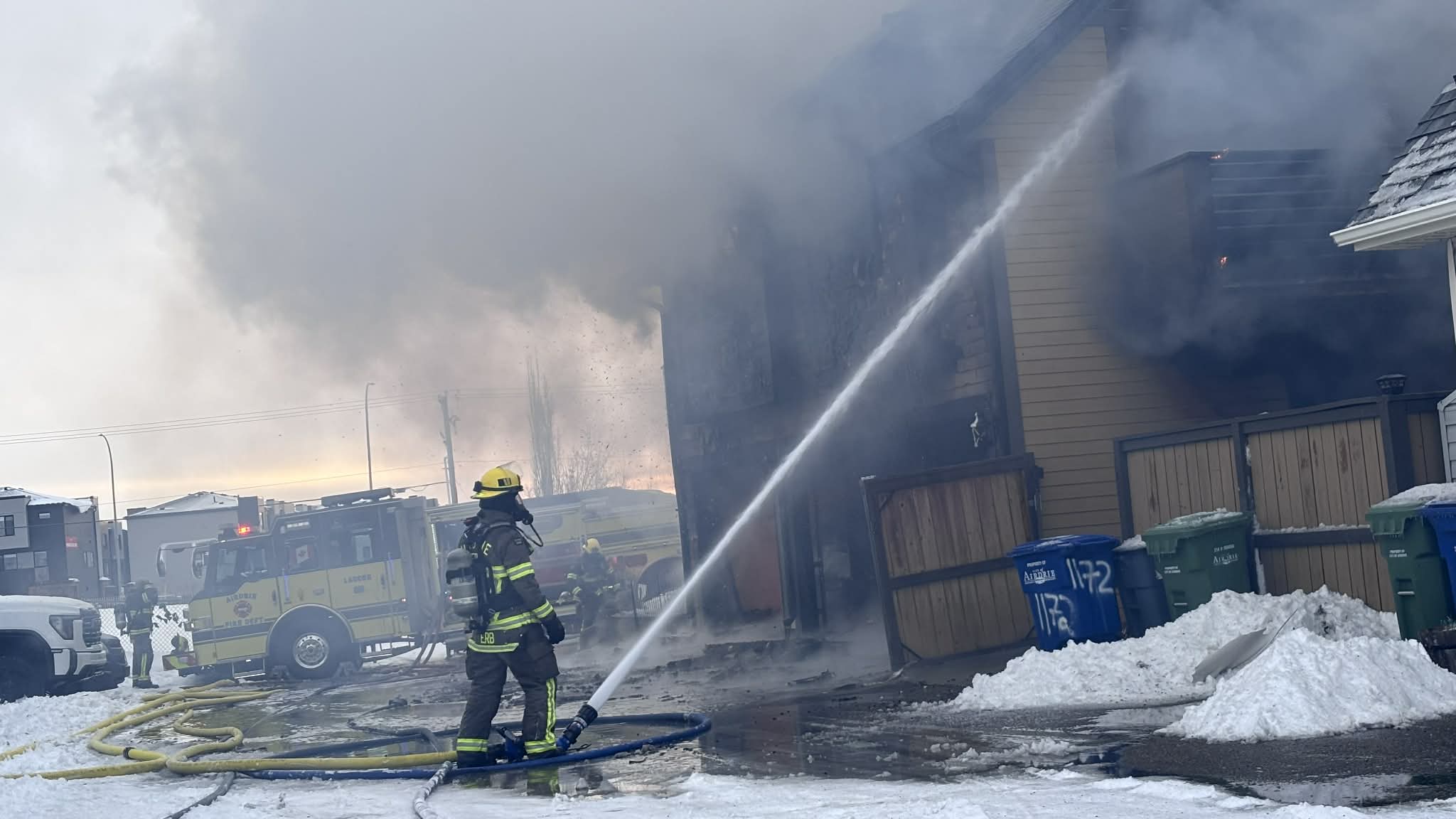 Update: Fire crews respond to house fire in Airdrie’s Canals ...
