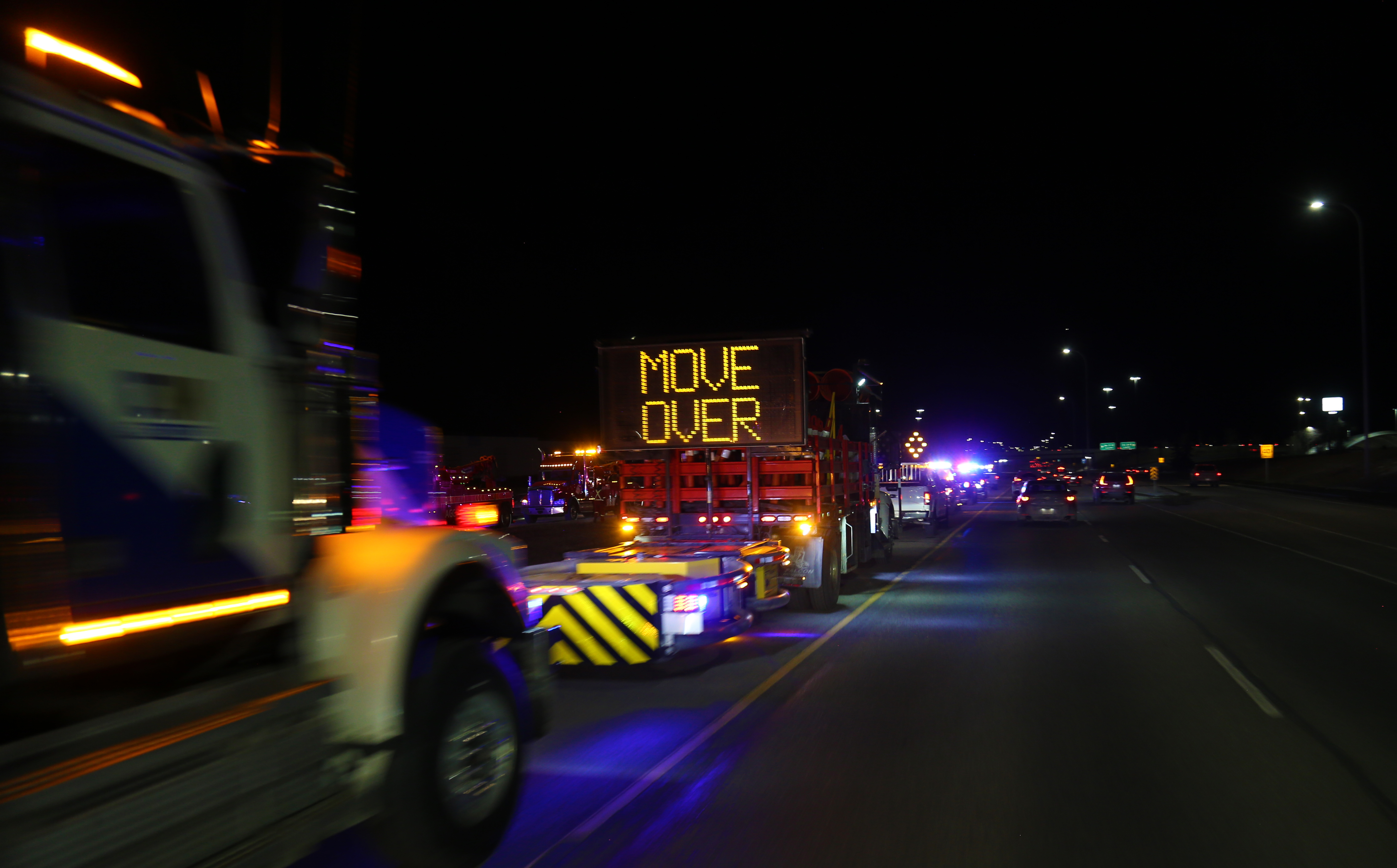 Tow trucks and emergency crews line Calgary roadway with message for ...
