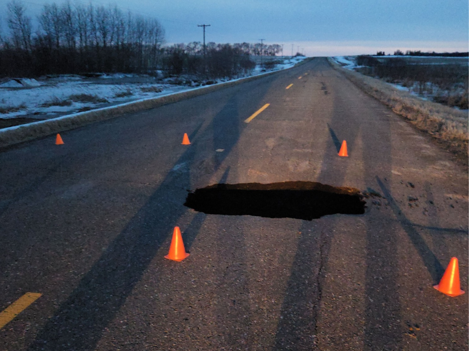 Highway reopened west of Foxwarren after sinkhole discovered ...