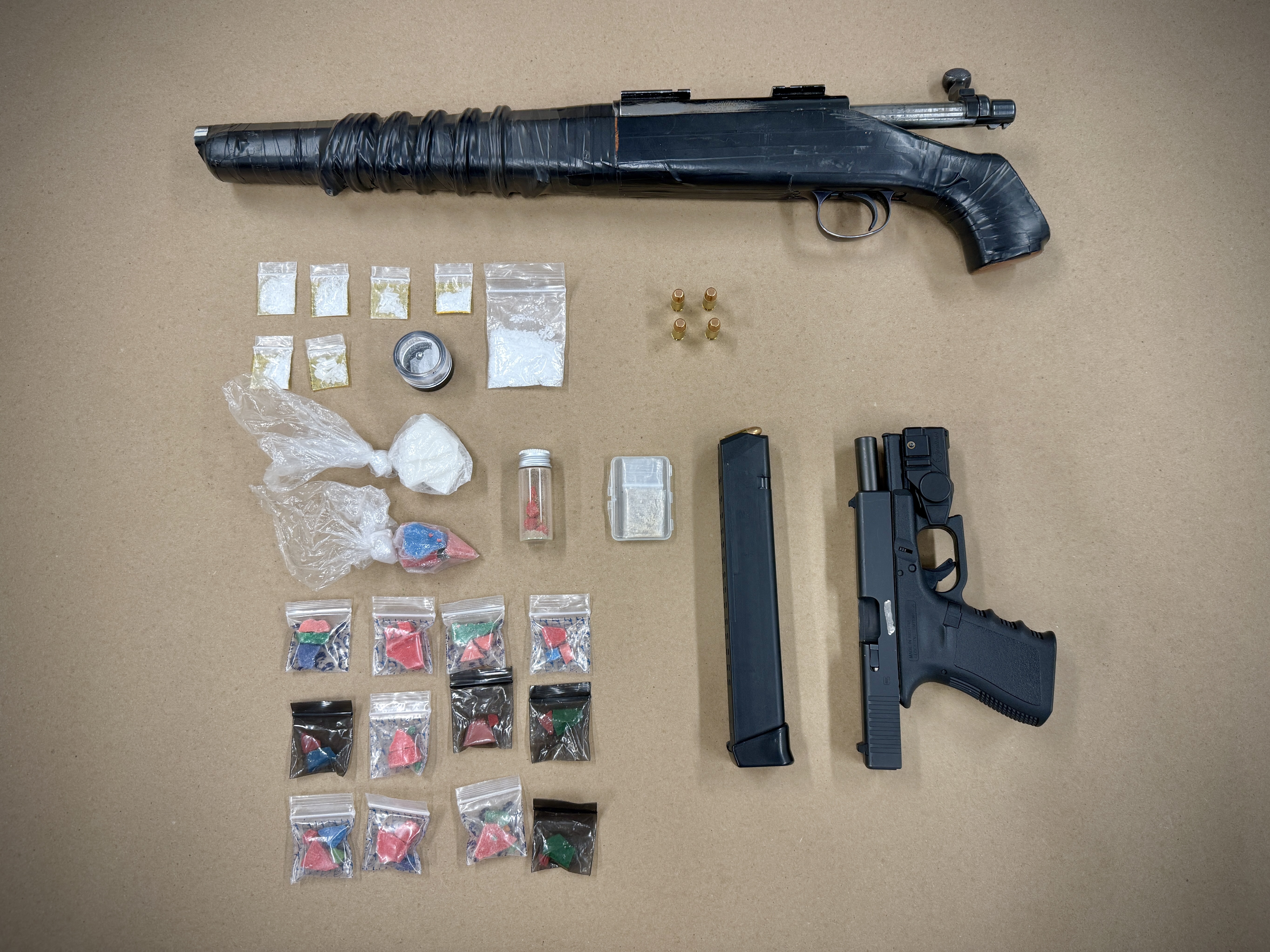 Two Calgary men charged after firearms, fentanyl seized by Cochrane ...