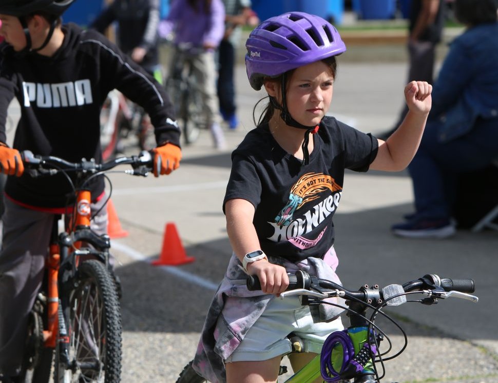 Community partners help prepare young cyclists for a safe summer ...